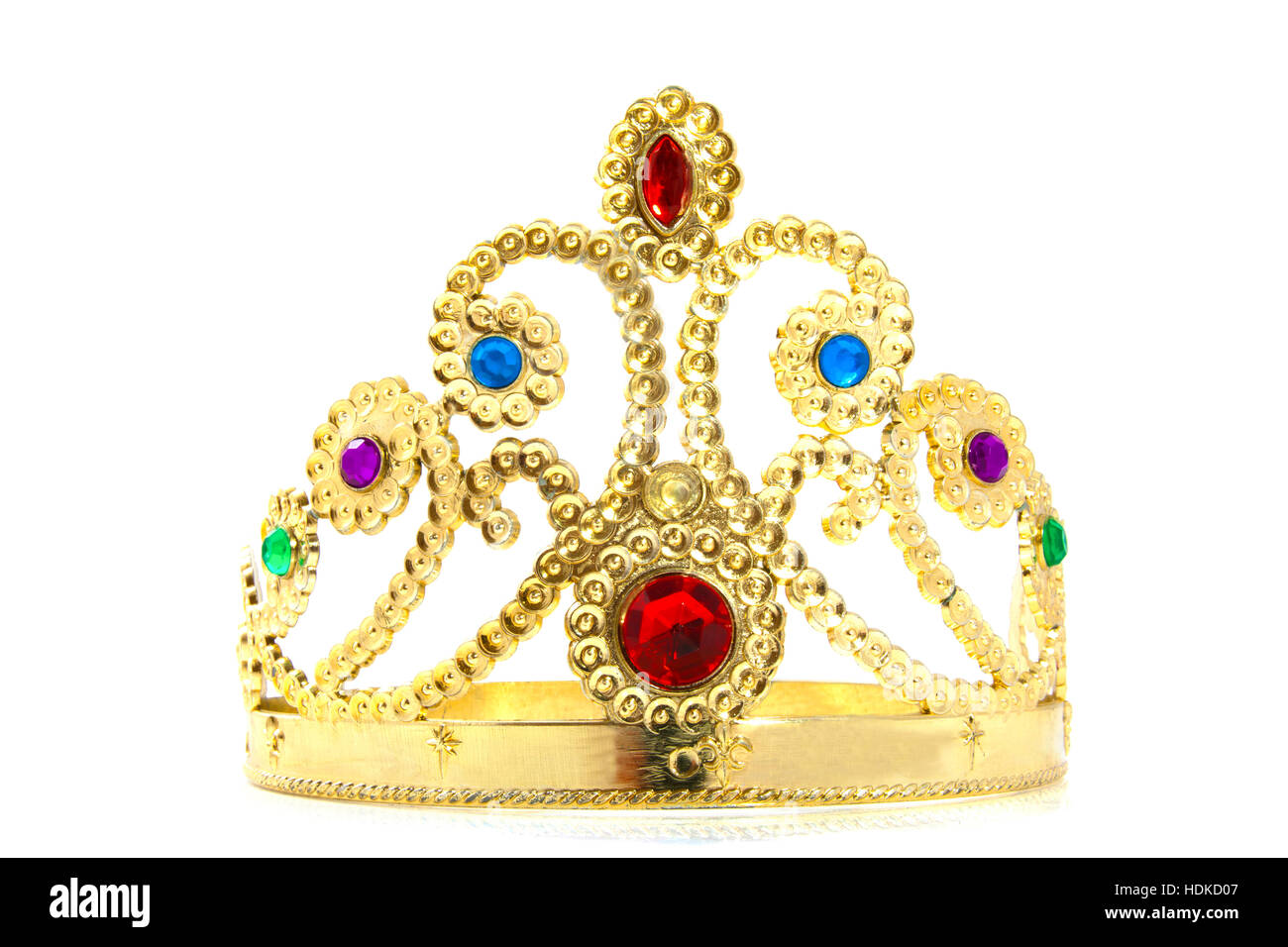 Golden crown with jewels isolated over white Stock Photo - Alamy