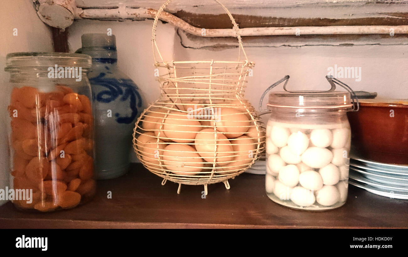 Old farm storage with pots eggs and fruit for background use Stock ...