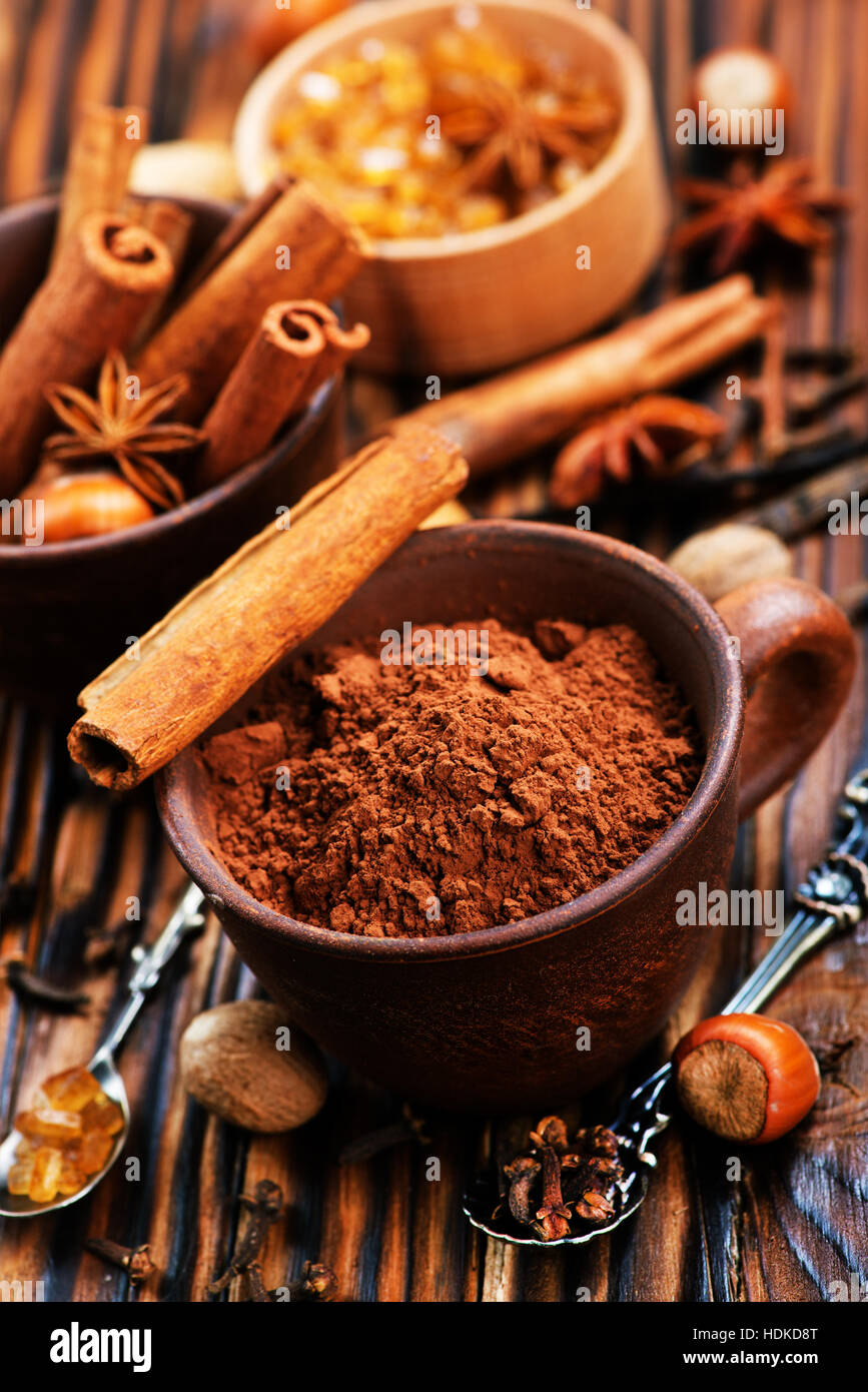 cocoa powder and aroma spice on a table Stock Photo - Alamy