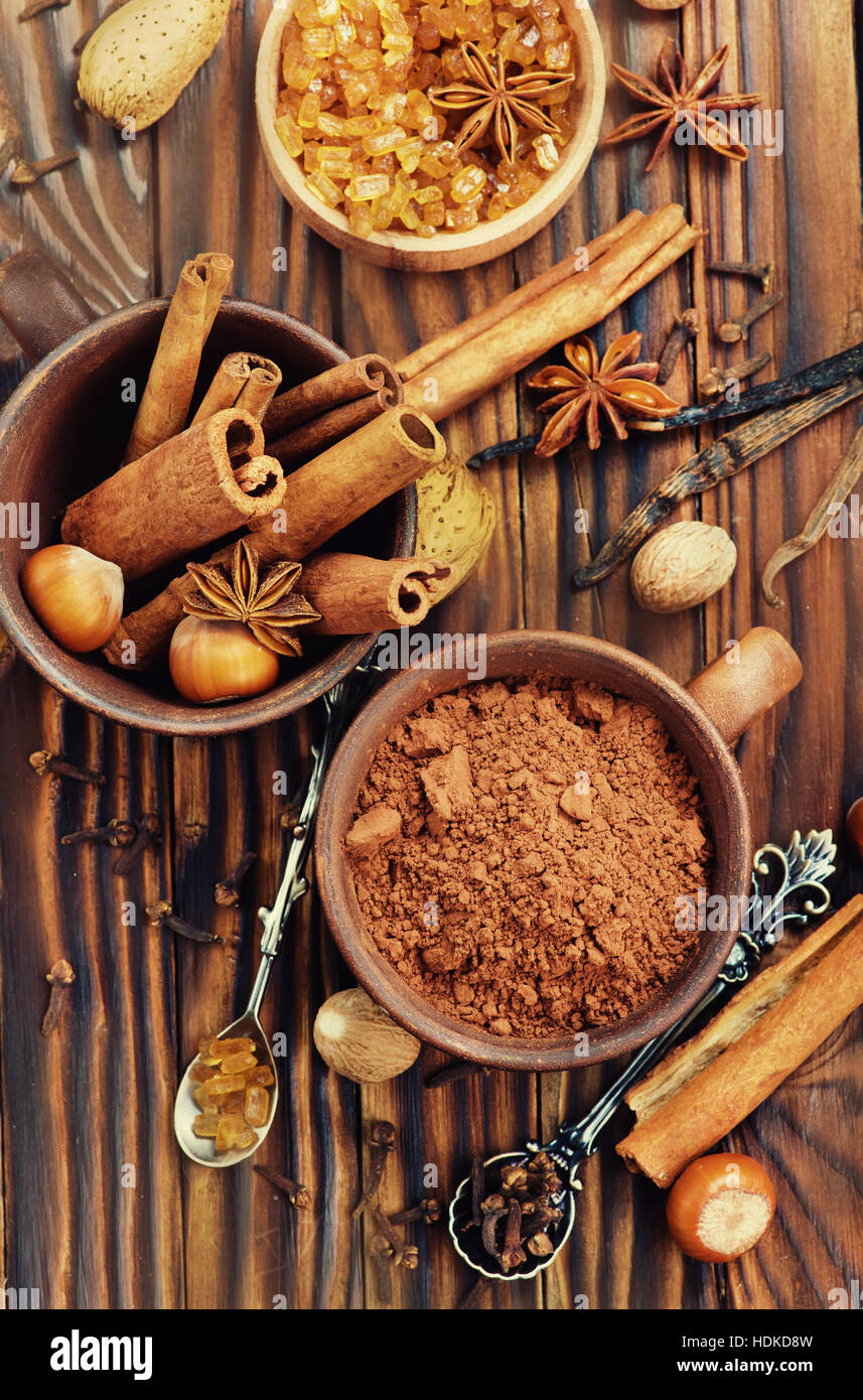 cocoa powder and aroma spice on a table Stock Photo - Alamy