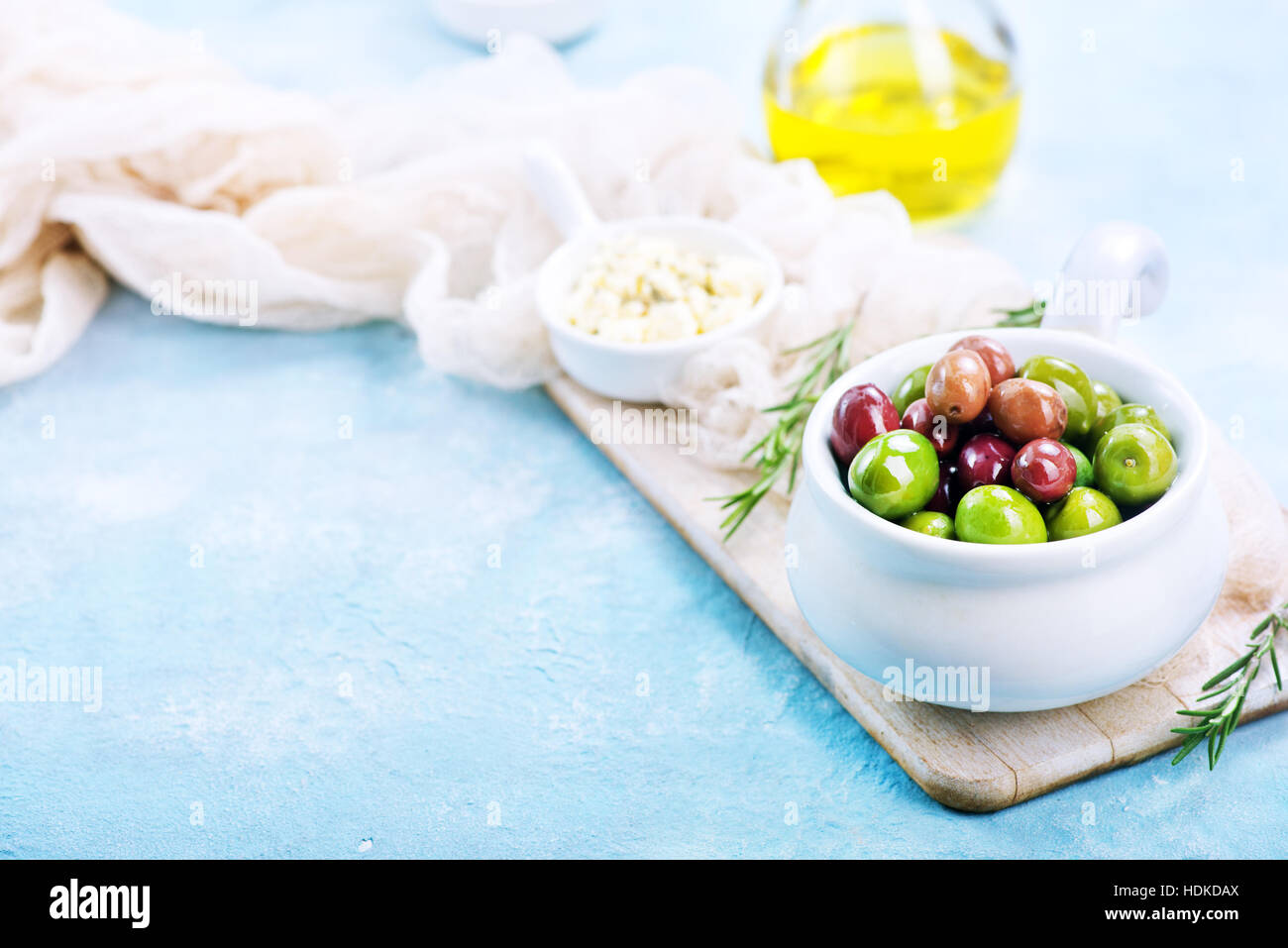 olives in bowl and on a table Stock Photo - Alamy