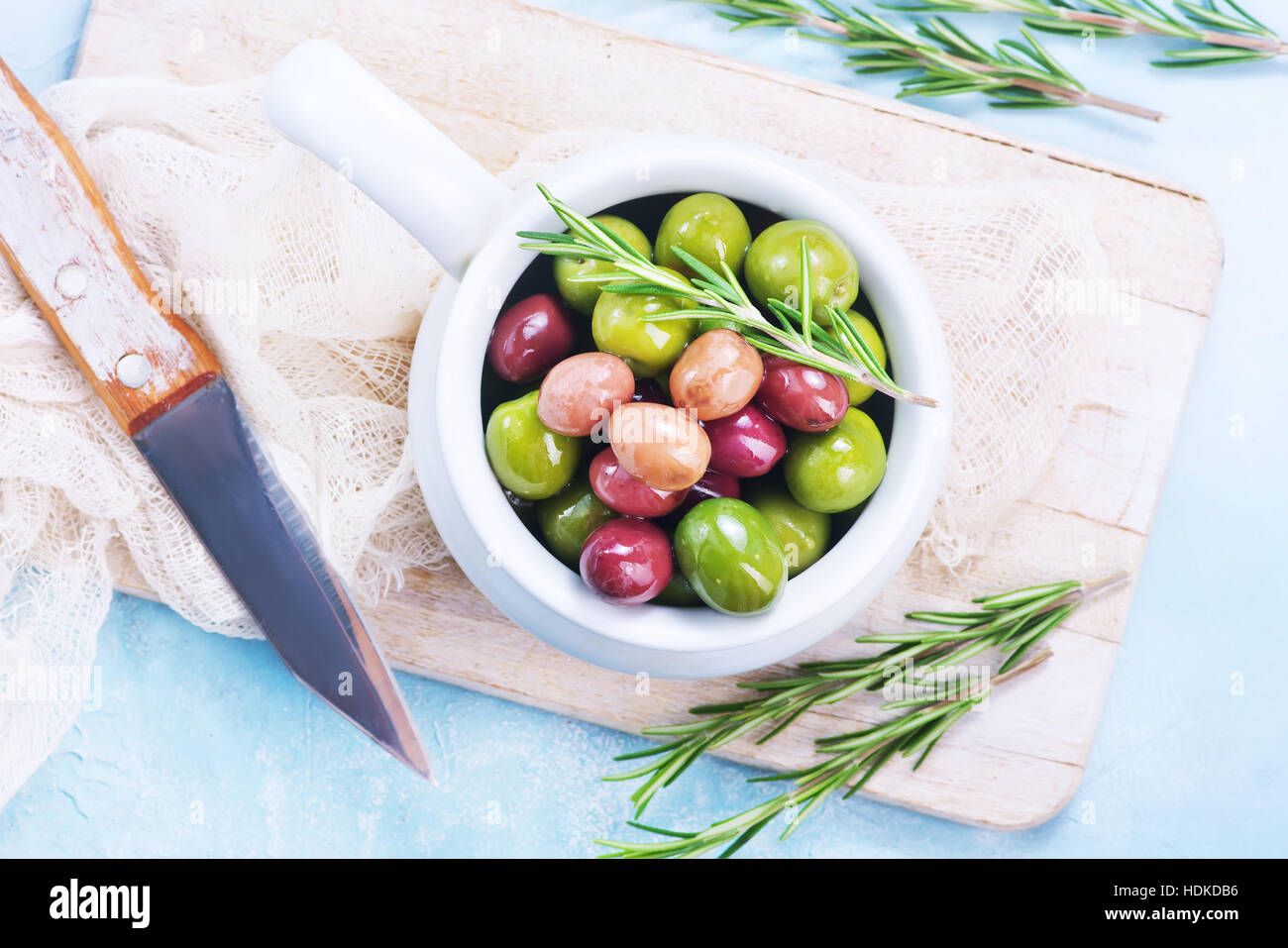 olives in bowl and on a table Stock Photo - Alamy