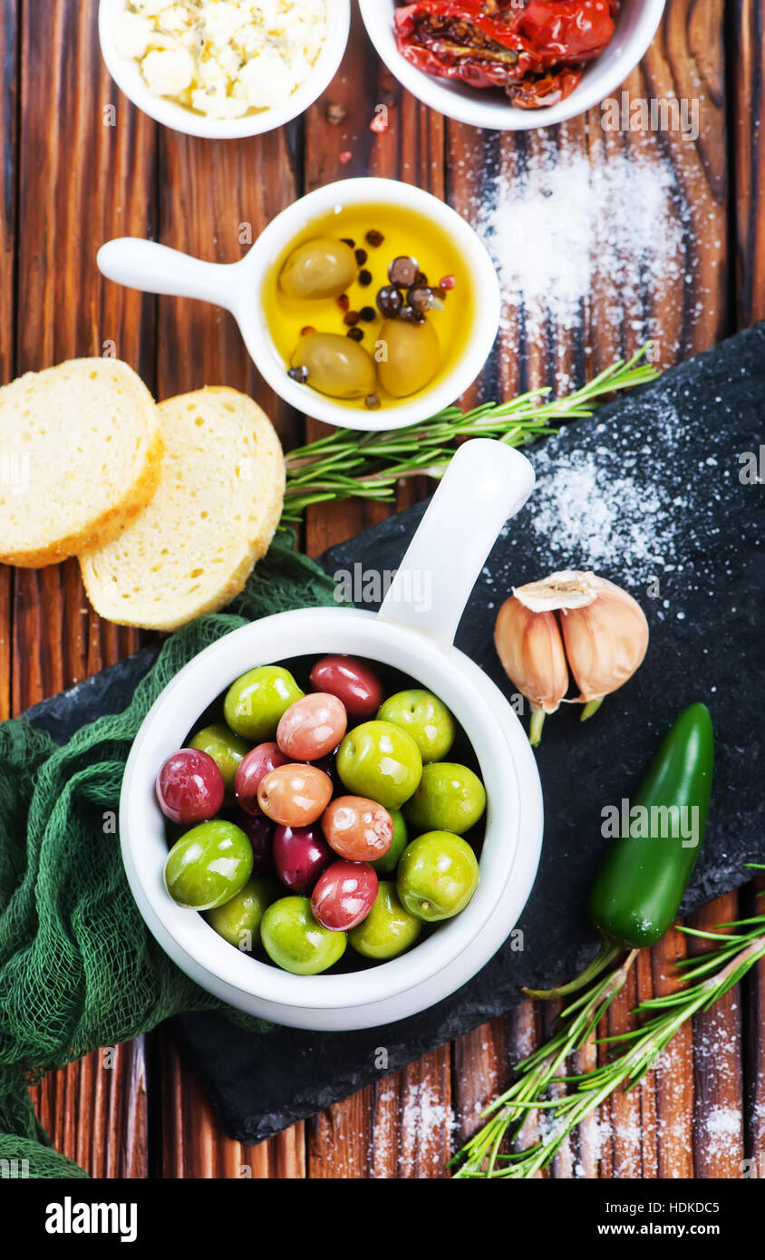 olives, cheese and dry tomato in bowl Stock Photo - Alamy