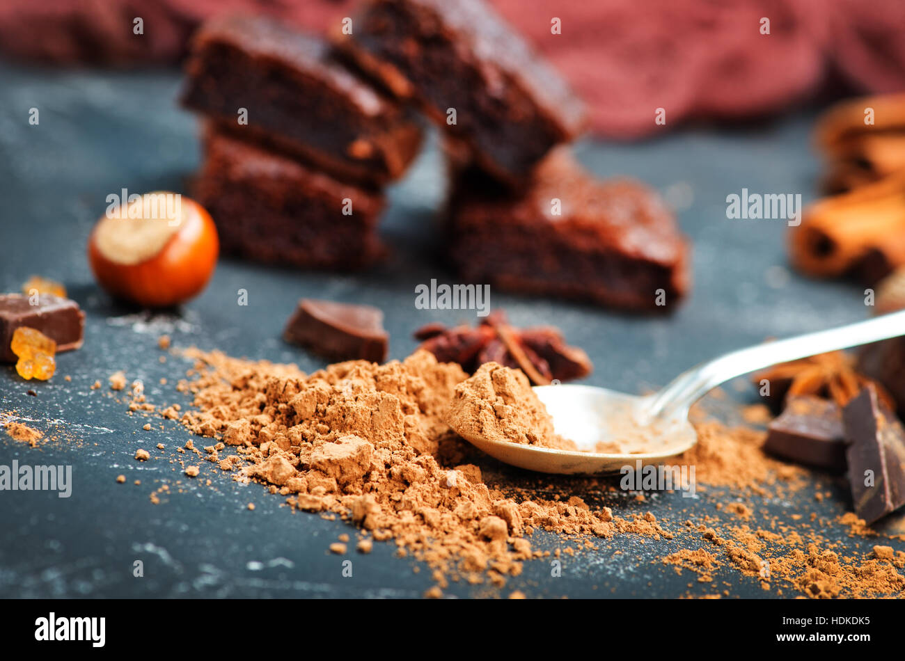 chocolate cake and cocoa powder on a table Stock Photo - Alamy