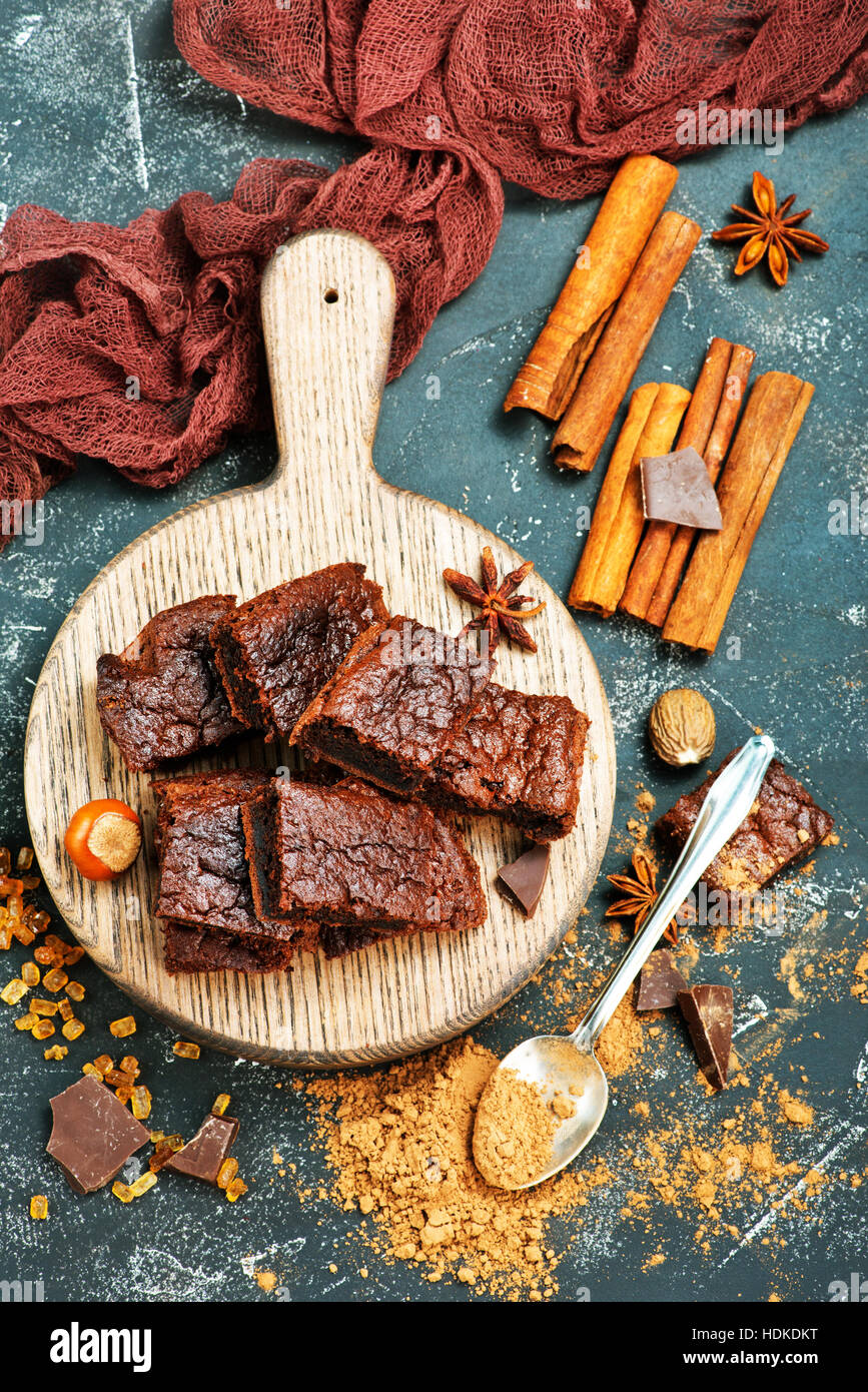 chocolate cake and cocoa powder on a table Stock Photo - Alamy
