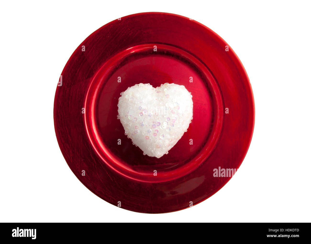 White glitter heart on shiny red plate isolated over white Stock Photo ...