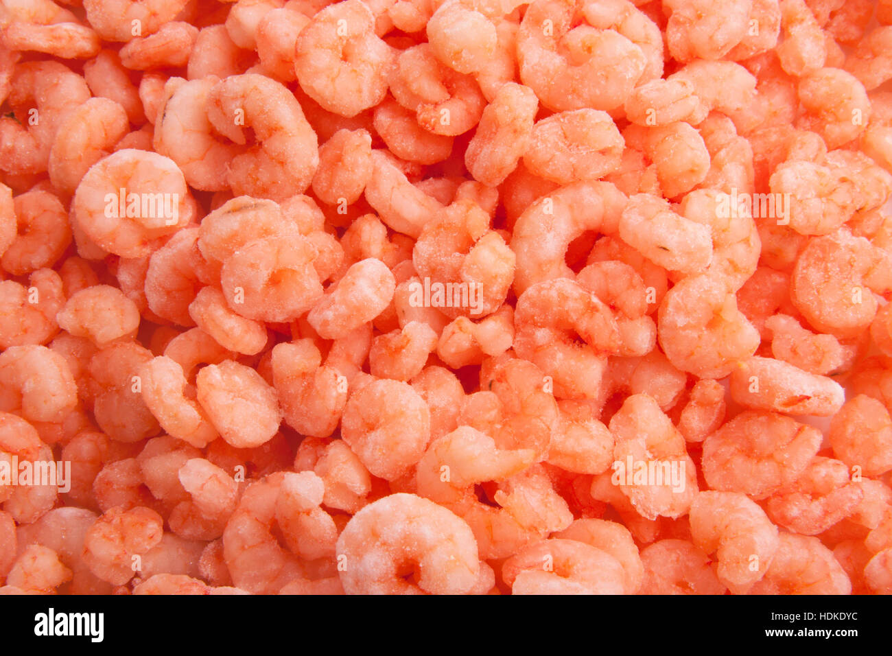 Lots of frozen shrimp for background use Stock Photo - Alamy