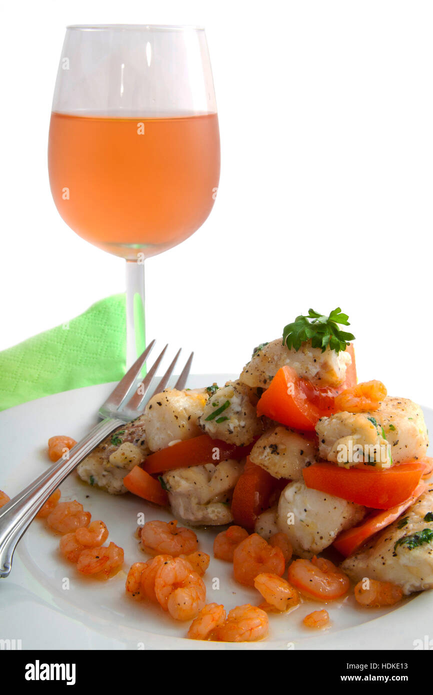 Nice fish dish with cod and shrimp Stock Photo - Alamy