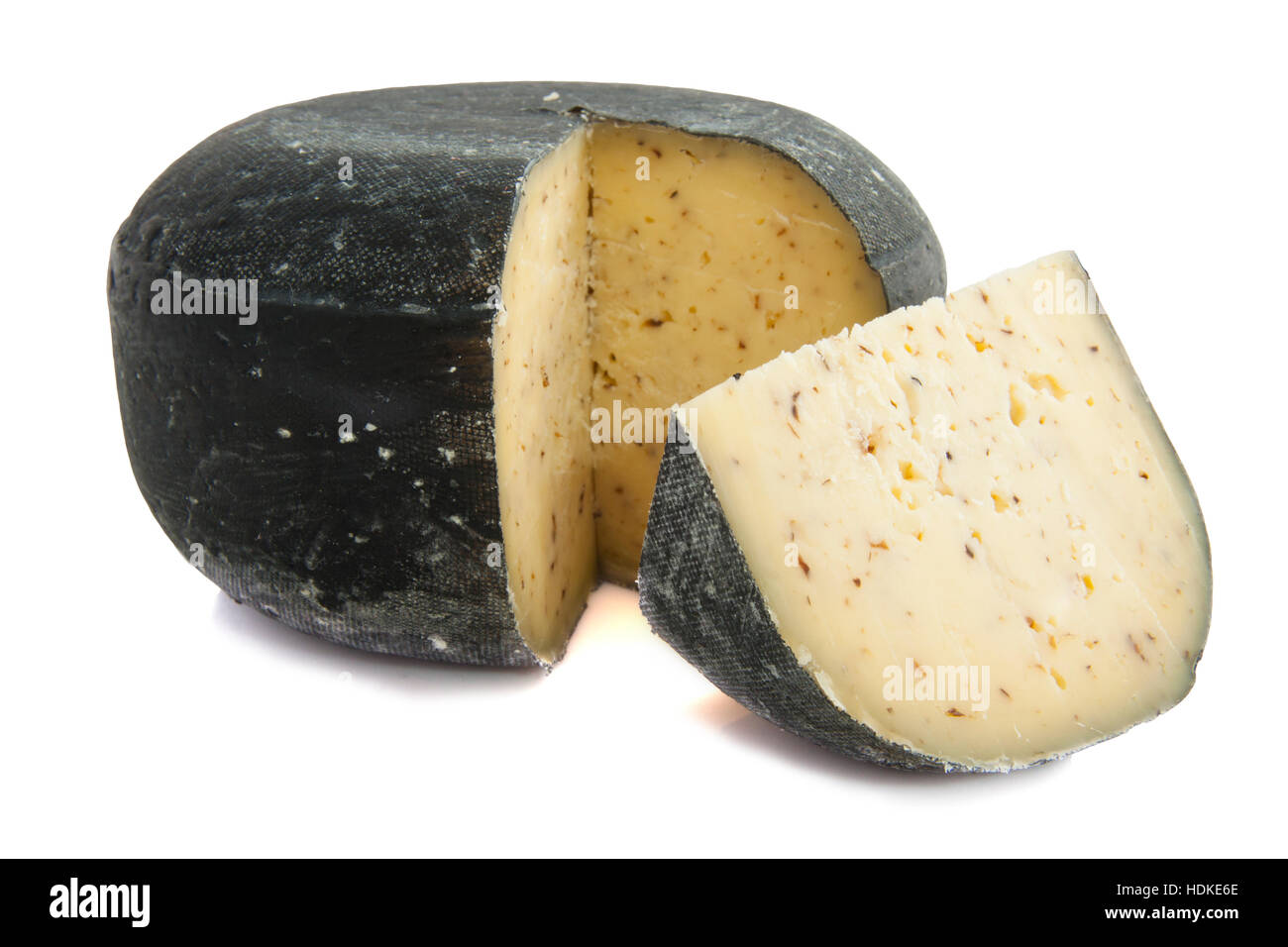 Piece of french truffle cheese isolated over white Stock Photo - Alamy
