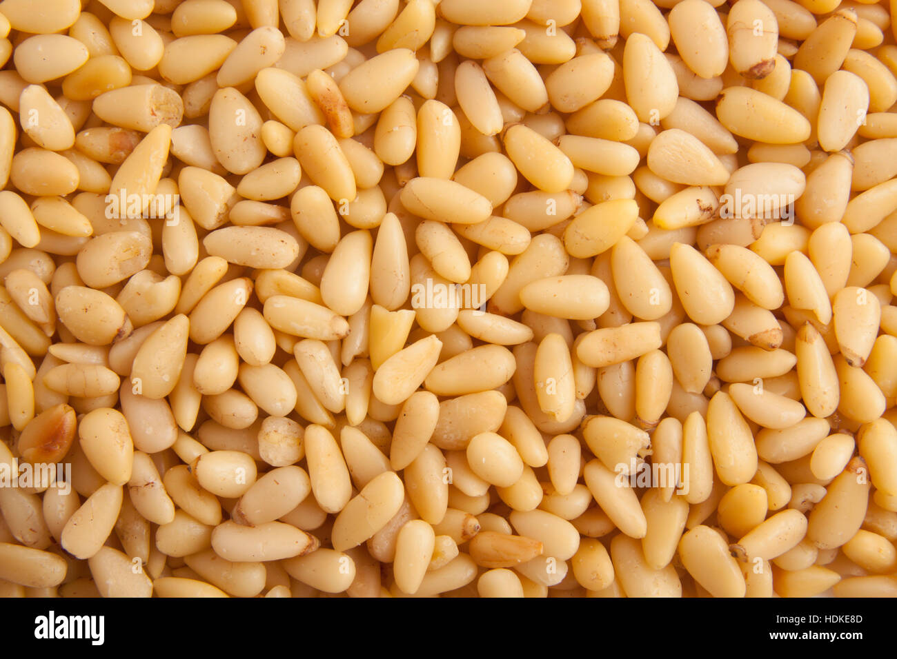 Lots of pine seeds for background use Stock Photo - Alamy