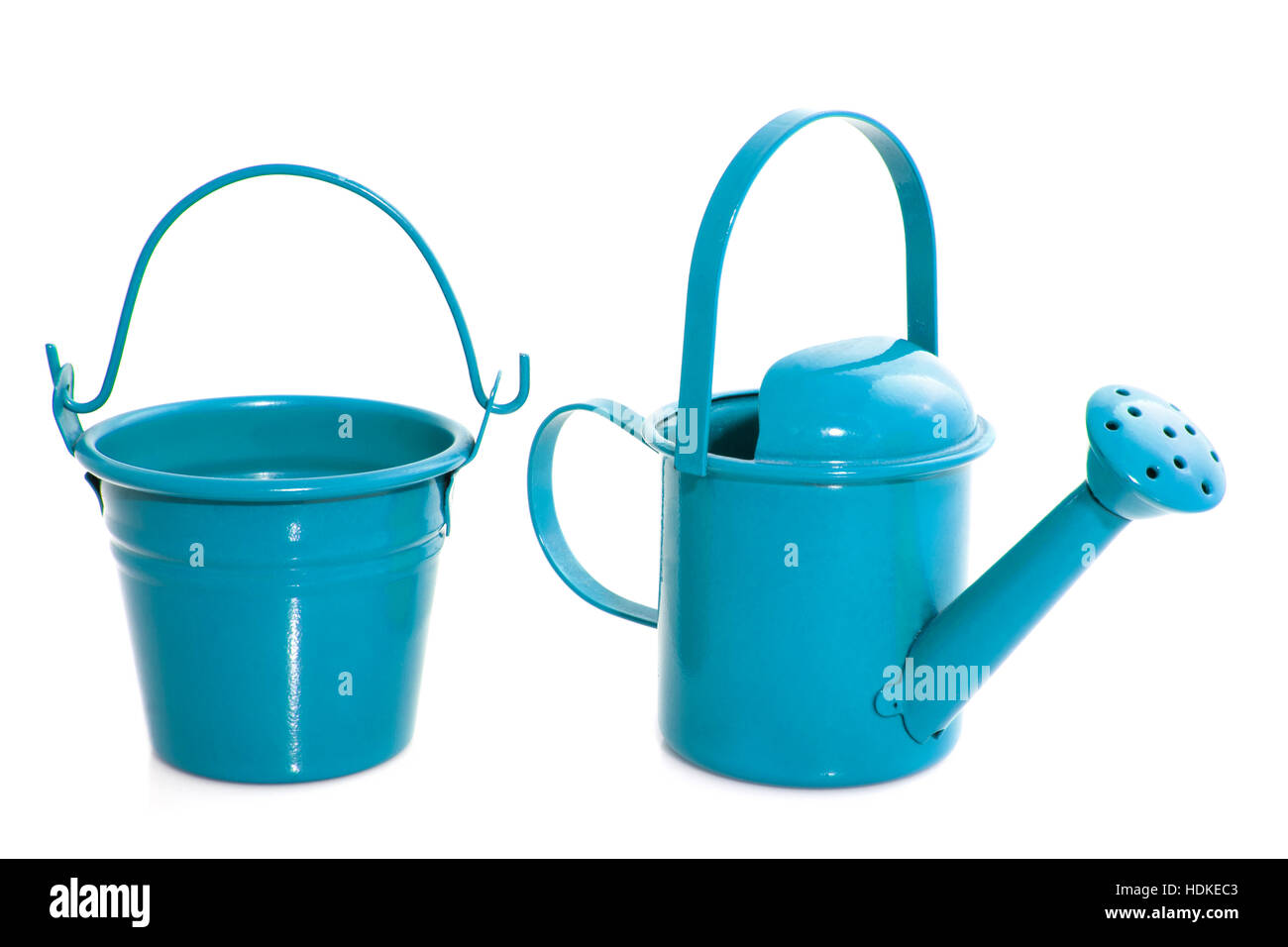 Blue bucket and blue watering can isolated over white Stock Photo - Alamy