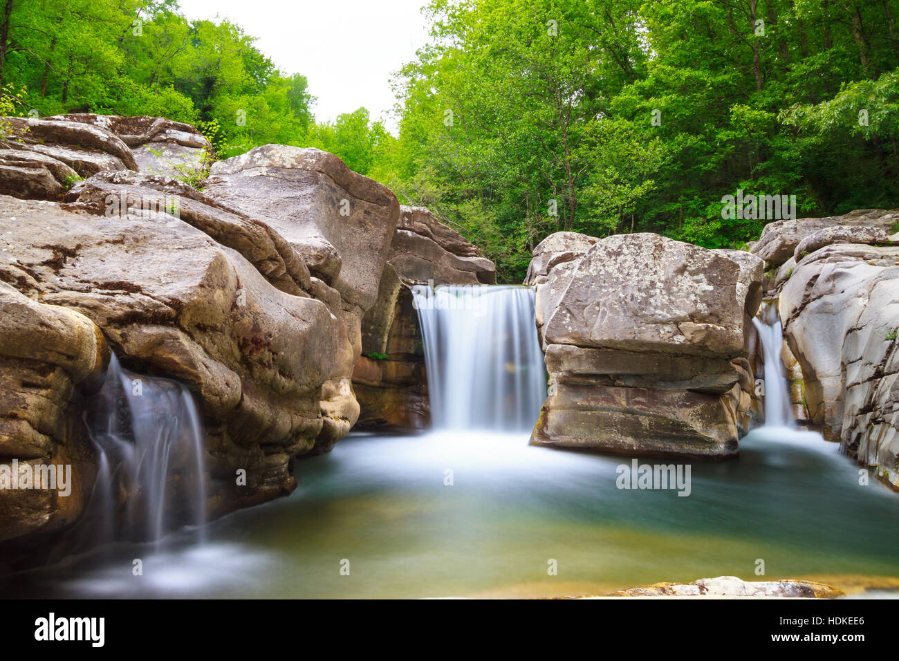 waterfall landscape with rocks and trees Stock Photo - Alamy