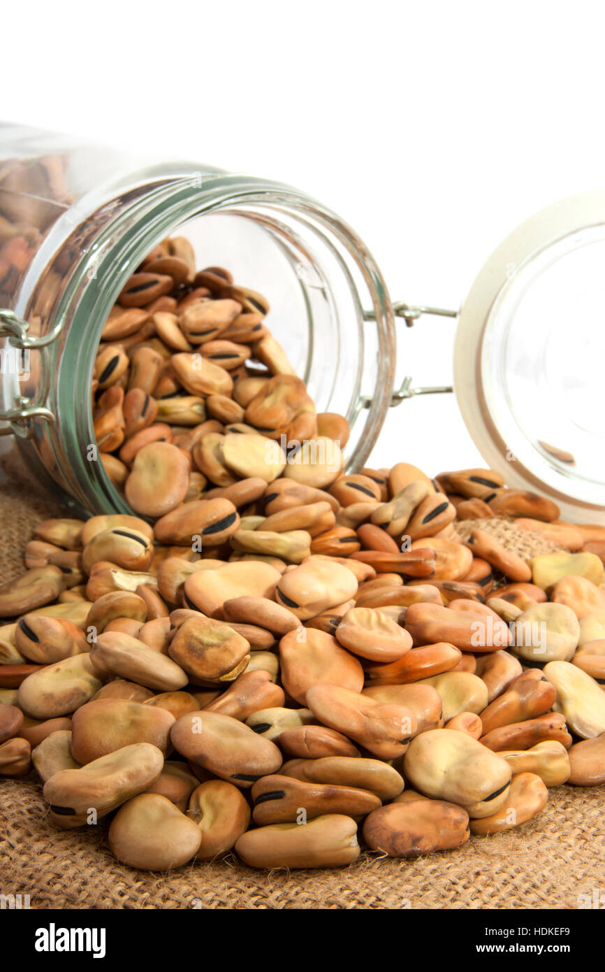 Beans in glass jar and on jute cloth for background use Stock Photo - Alamy