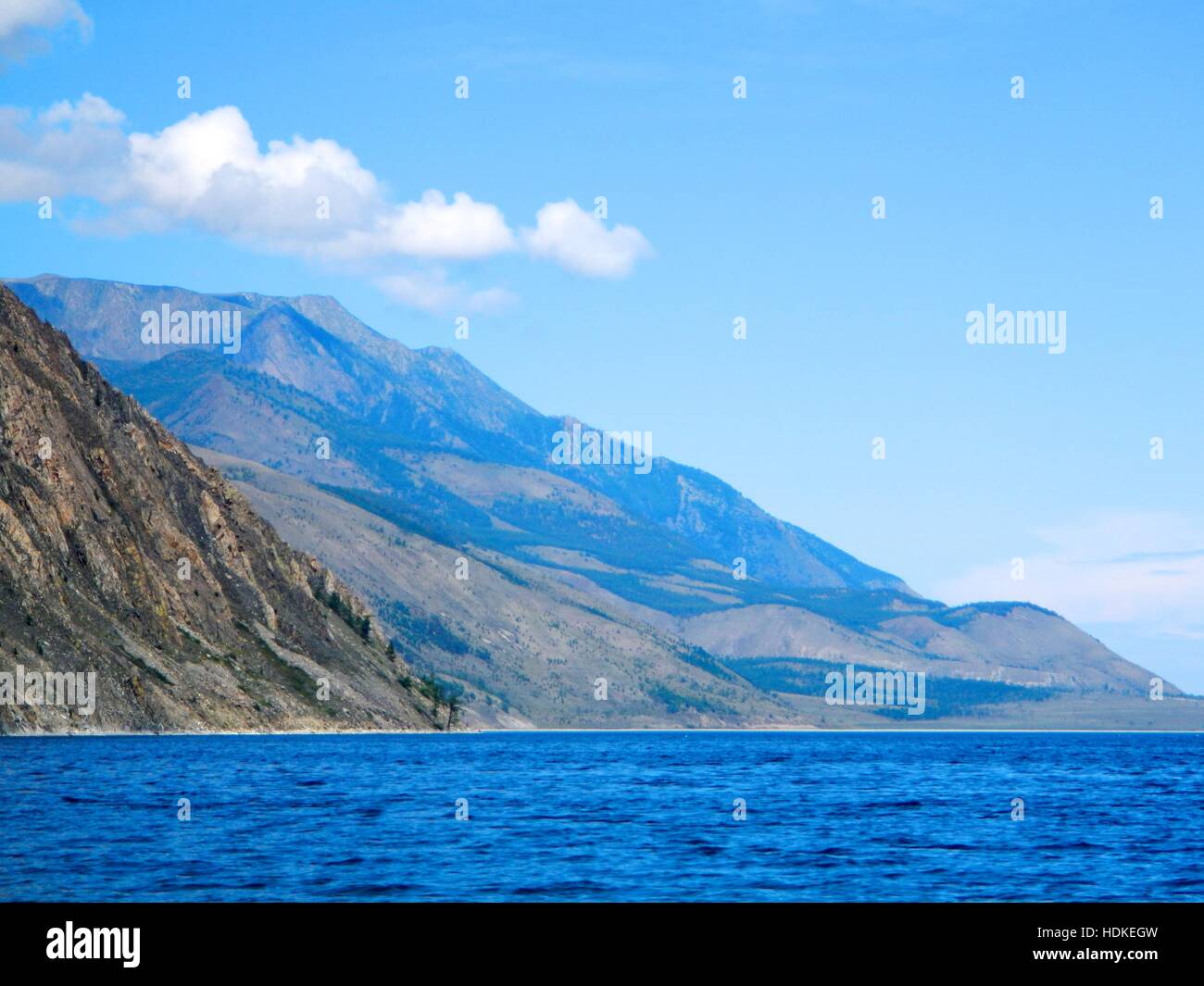 Baikal landscape with green spring forest and blue sky background Stock ...