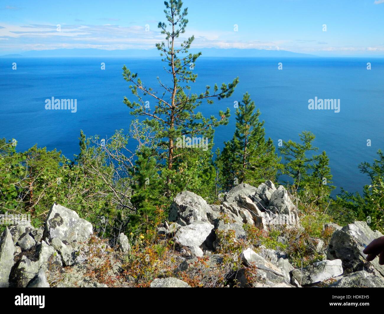 Baikal landscape with green spring forest and blue sky background Stock ...