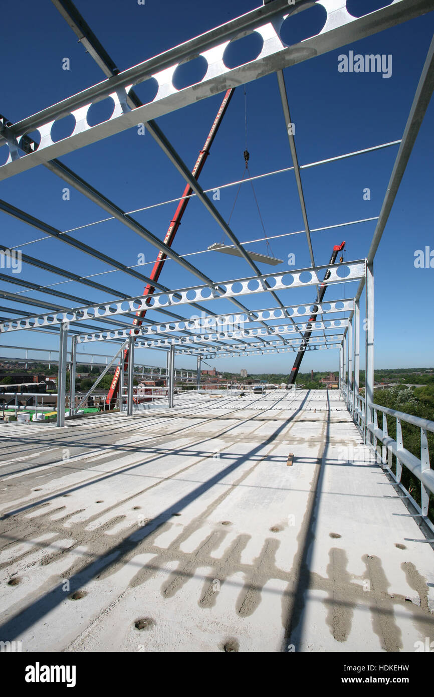 Construction site with PCC plank floor deck, structural steel frame and ...