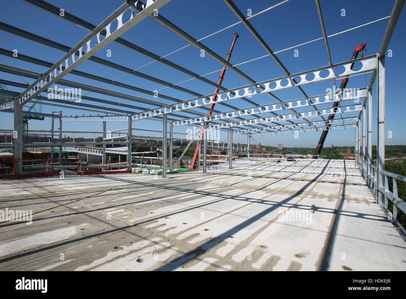 Construction site with PCC plank floor deck, structural steel frame and ...