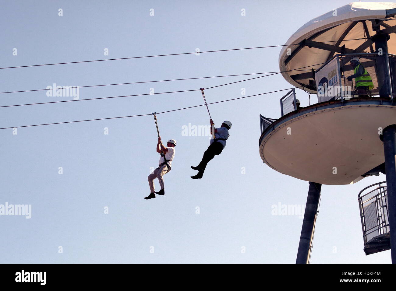Two gents beginning the zip wire descent from the tower on Bournemouth ...