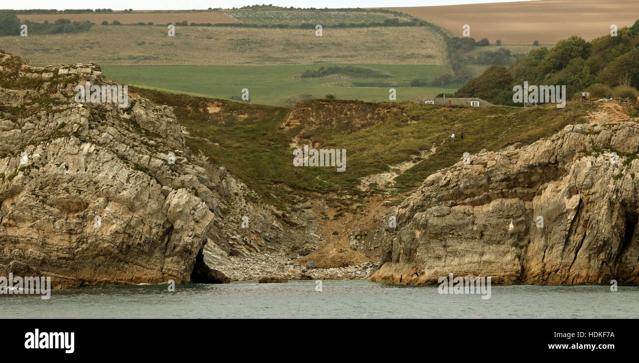 Sea facing limestone cliff structure at Stair Hole near Lulworth Cove ...