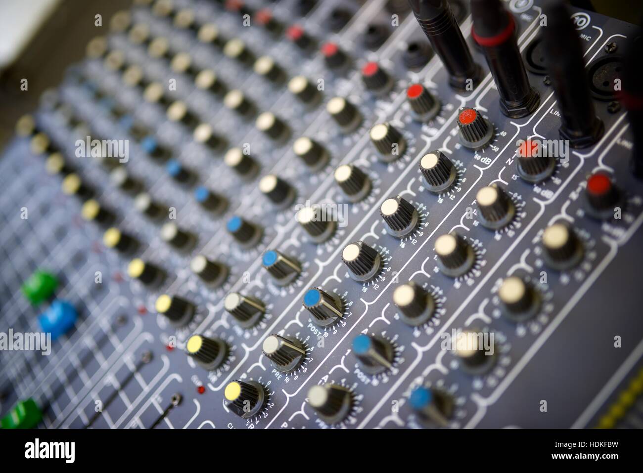Management handles close up of mixer panel Stock Photo - Alamy