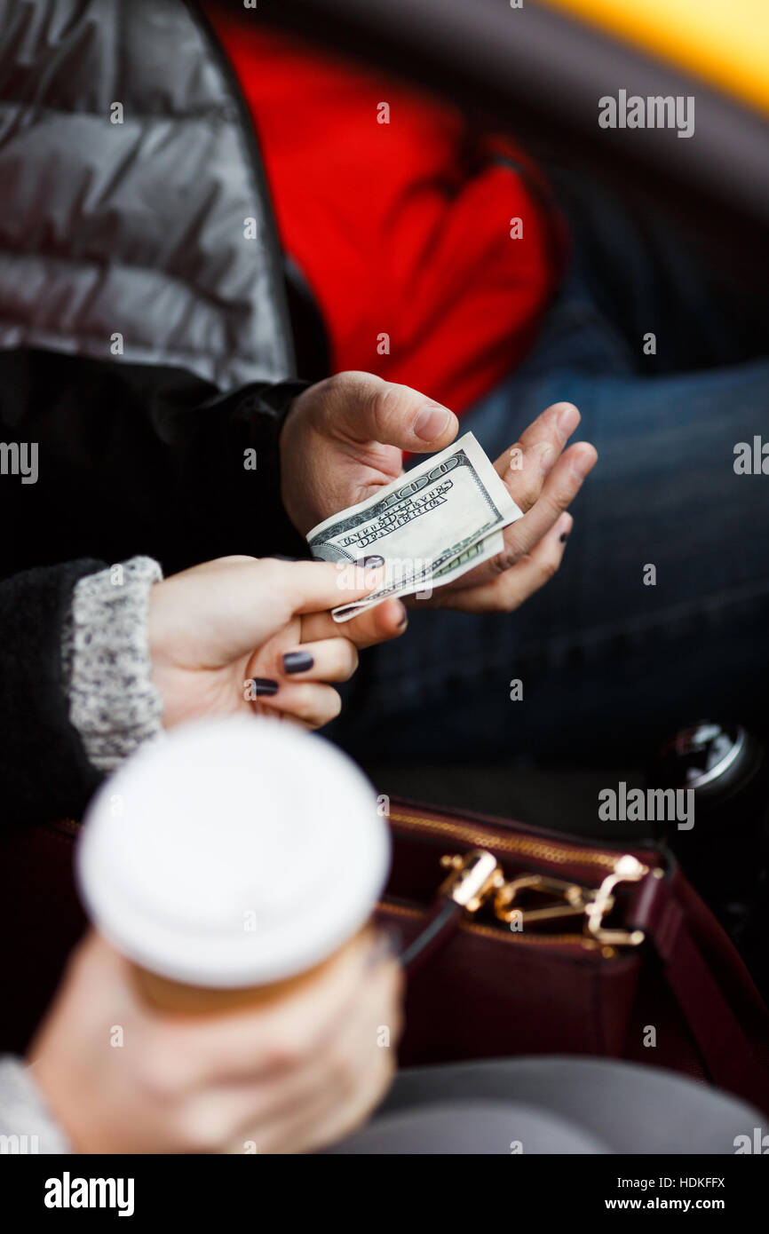 Girl taxi driver holding money hi-res stock photography and images - Alamy