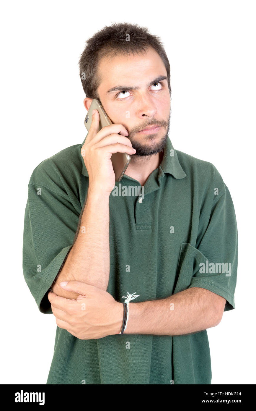 Angry young man with cellphone doing funny faces isolated in white ...