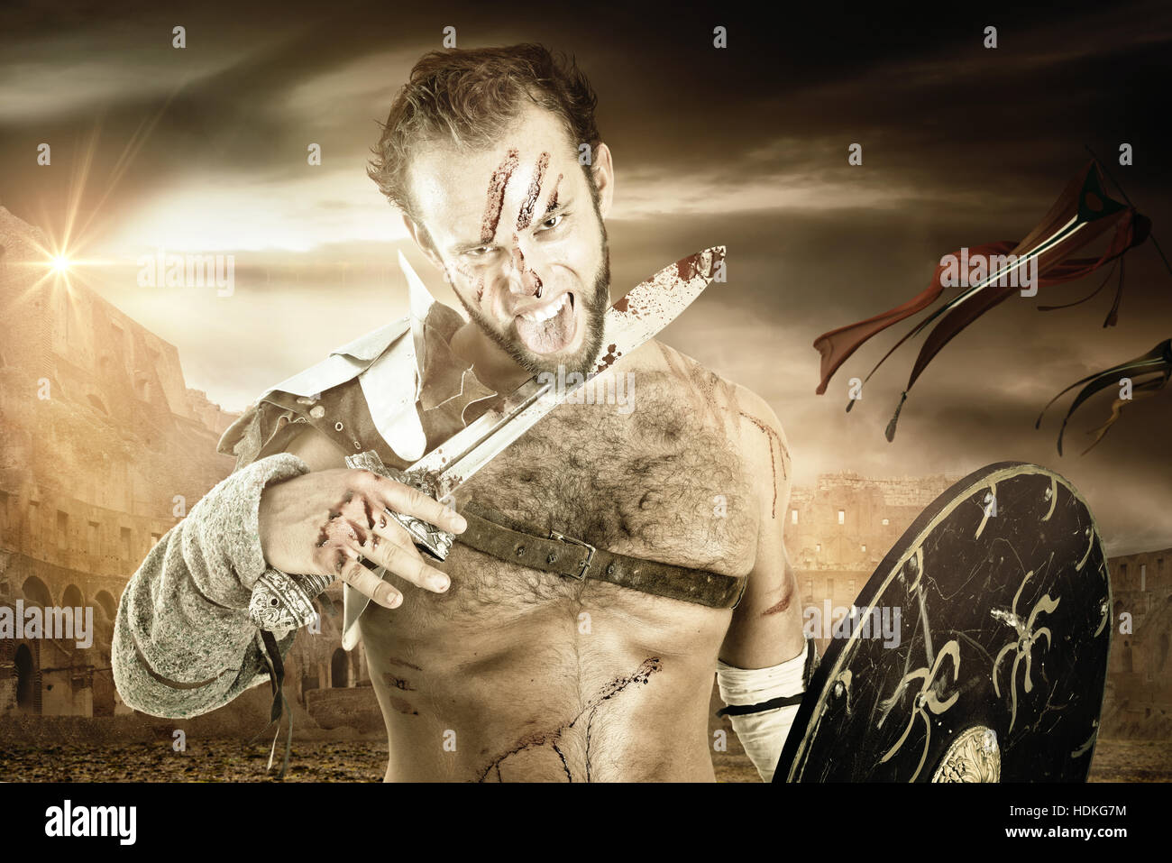 Ancient warrior or Gladiator posing outdoors with sword Stock Photo - Alamy