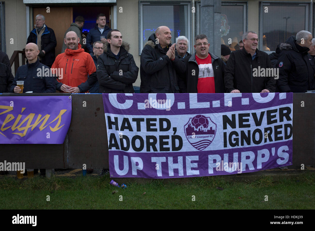 Spectators gather in front of the club house at the Delta Taxis Stadium ...
