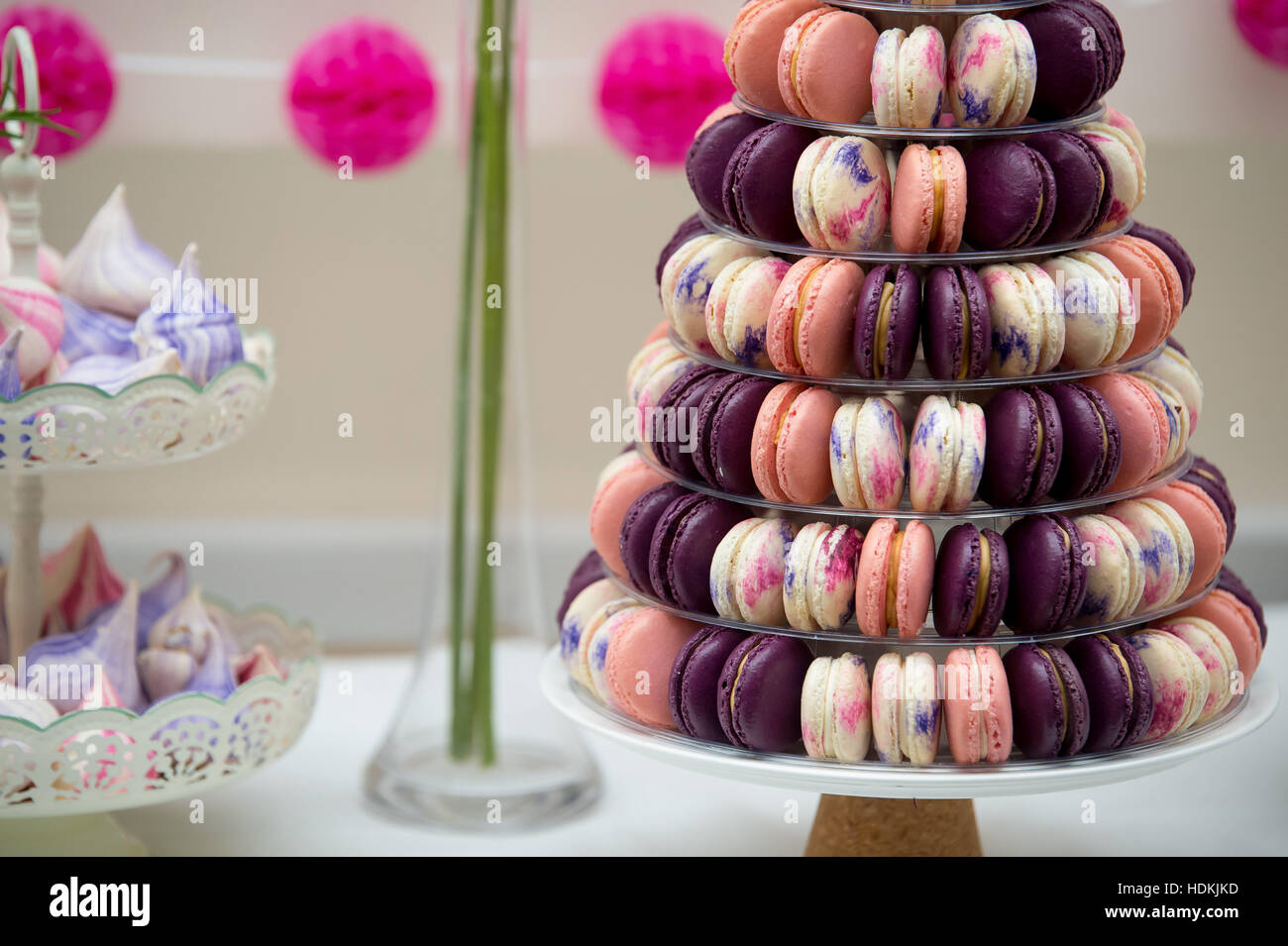 A macaroon cake. Macaroons set out in a tower formation to look like a ...