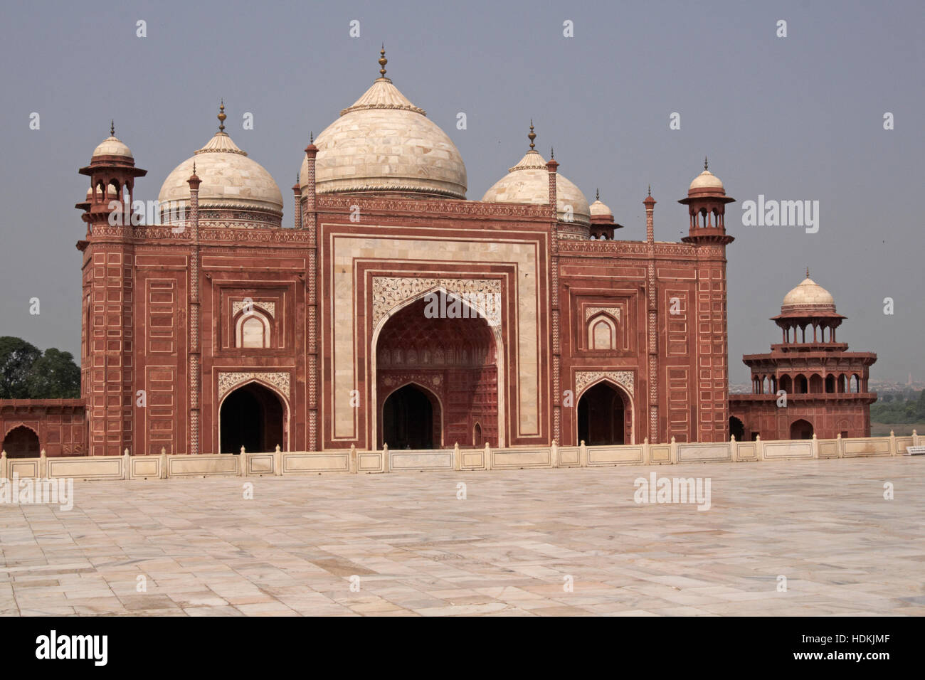Mosque at the Taj Mahal. Mughal style building of red sandstone inlaid ...