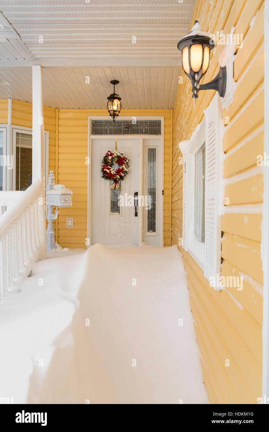 A front entrance door with snow drifts after a blizzard in Winkler ...