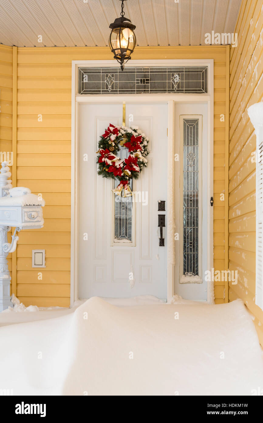 A front entrance door with snow drifts after a blizzard in Winkler ...