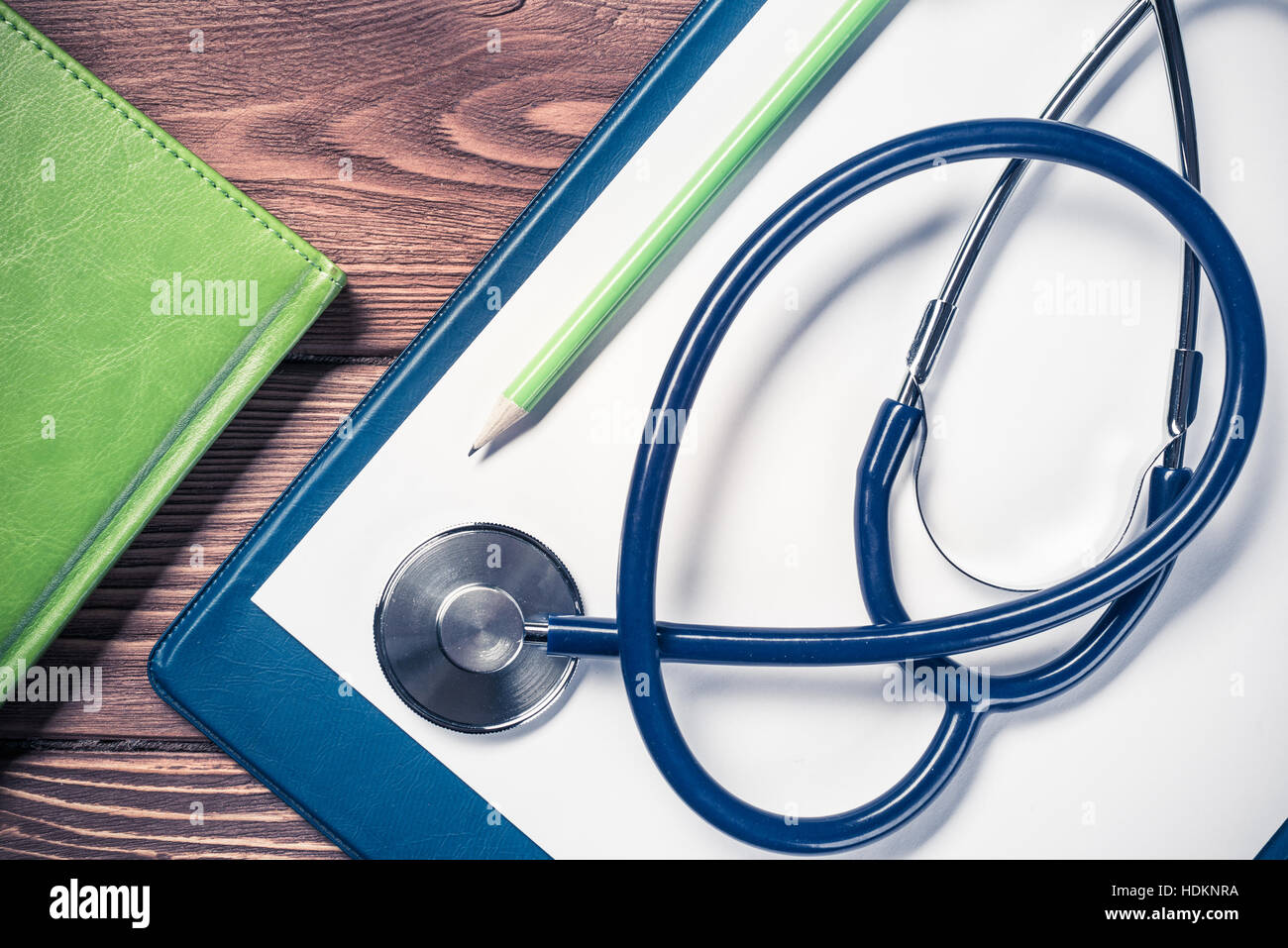 Desk of doctor with medicine things Stock Photo - Alamy