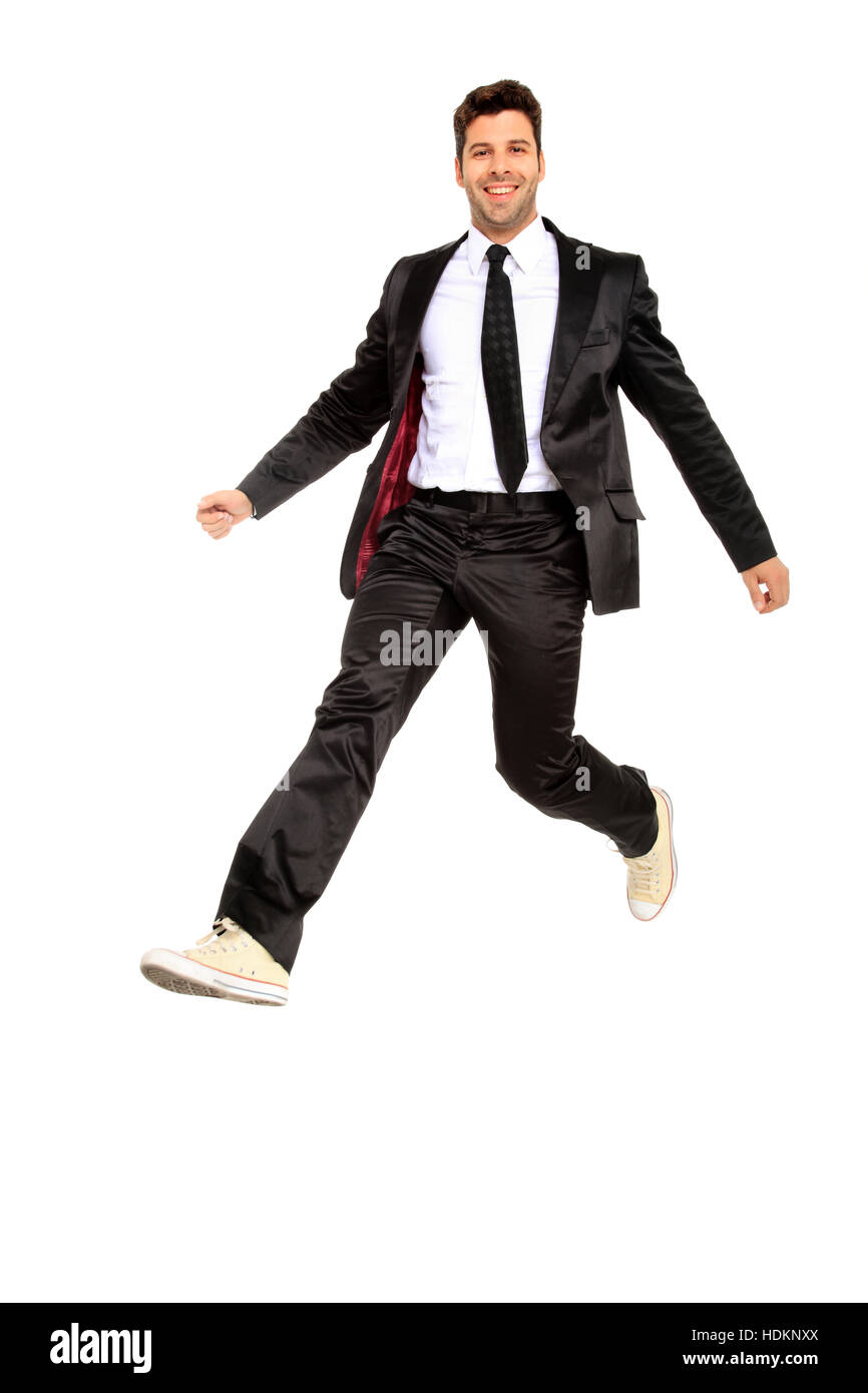handsome jumping man on suit isolated on a white background Stock Photo ...