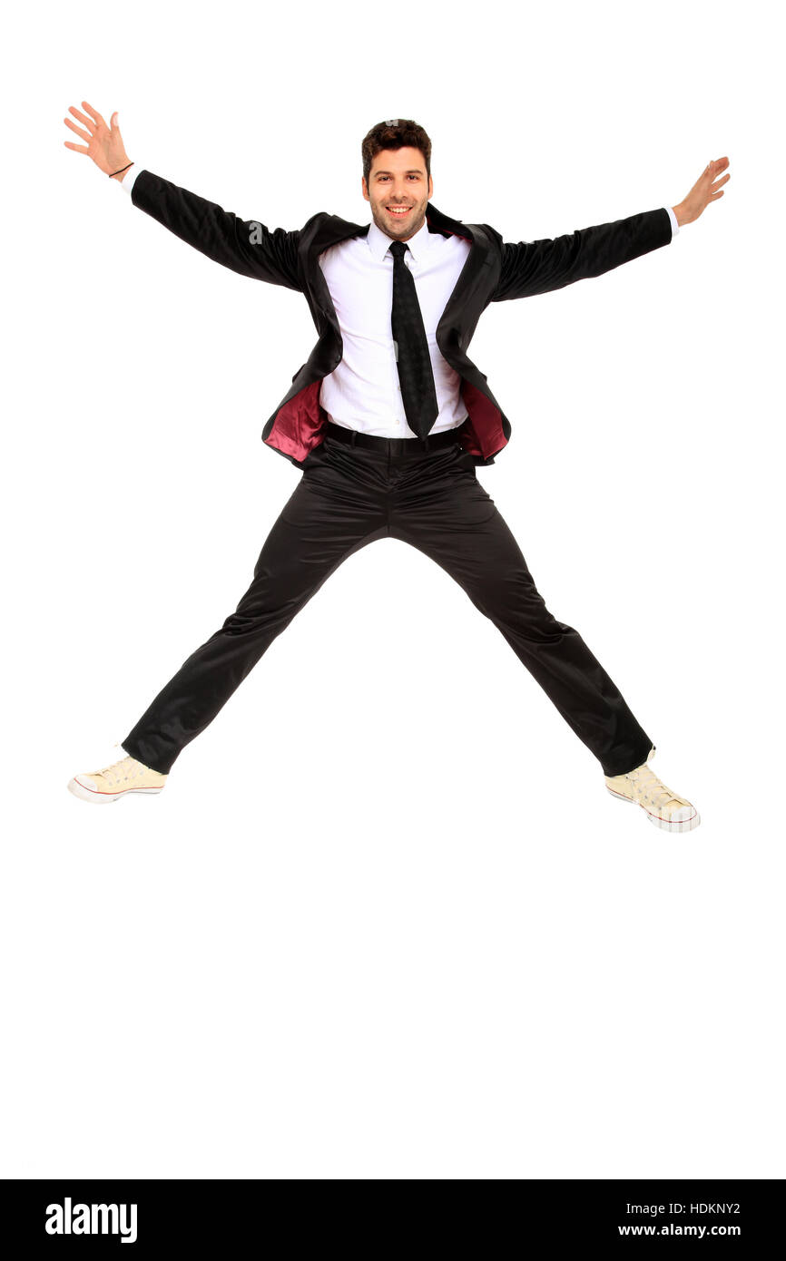 handsome jumping man on suit isolated on a white background Stock Photo ...