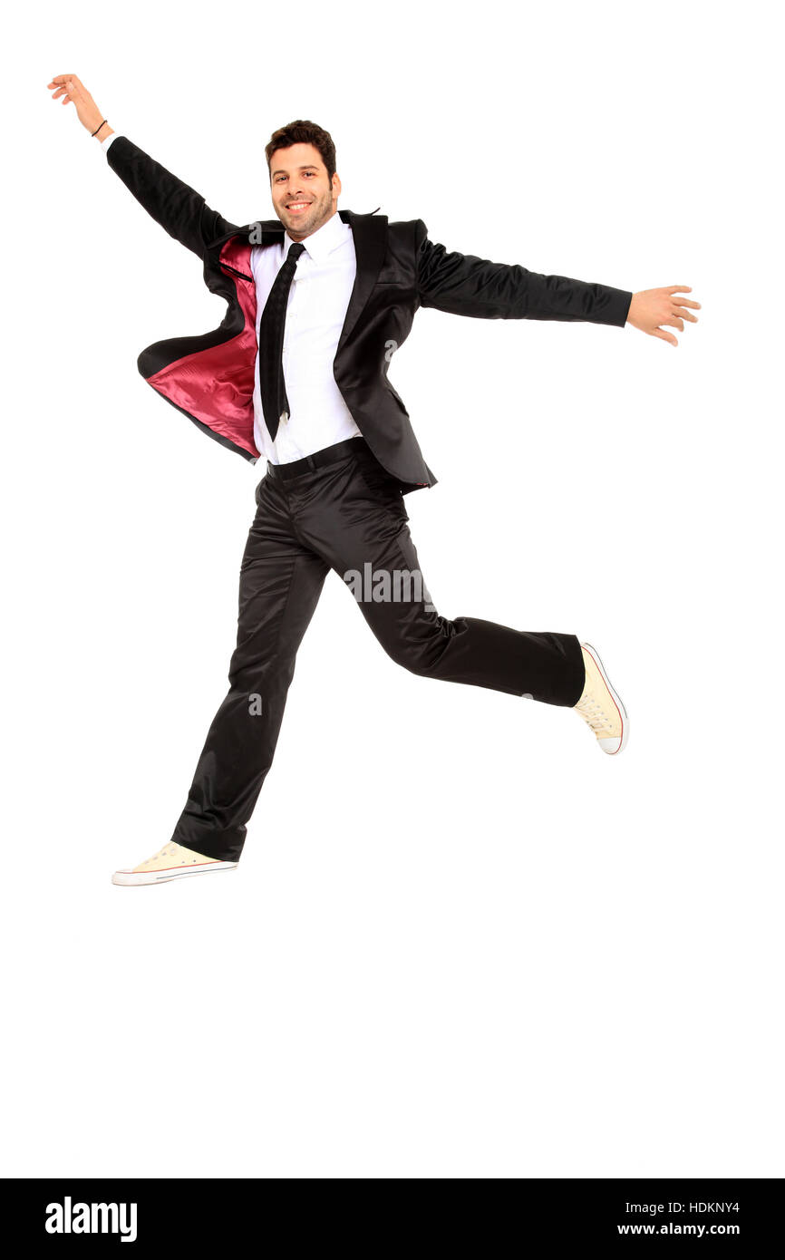 handsome jumping man on suit isolated on a white background Stock Photo ...