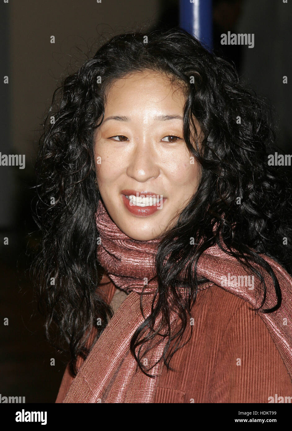 Sandra Oh at the premiere of the film, 'Closer' at Mann Village theatre ...