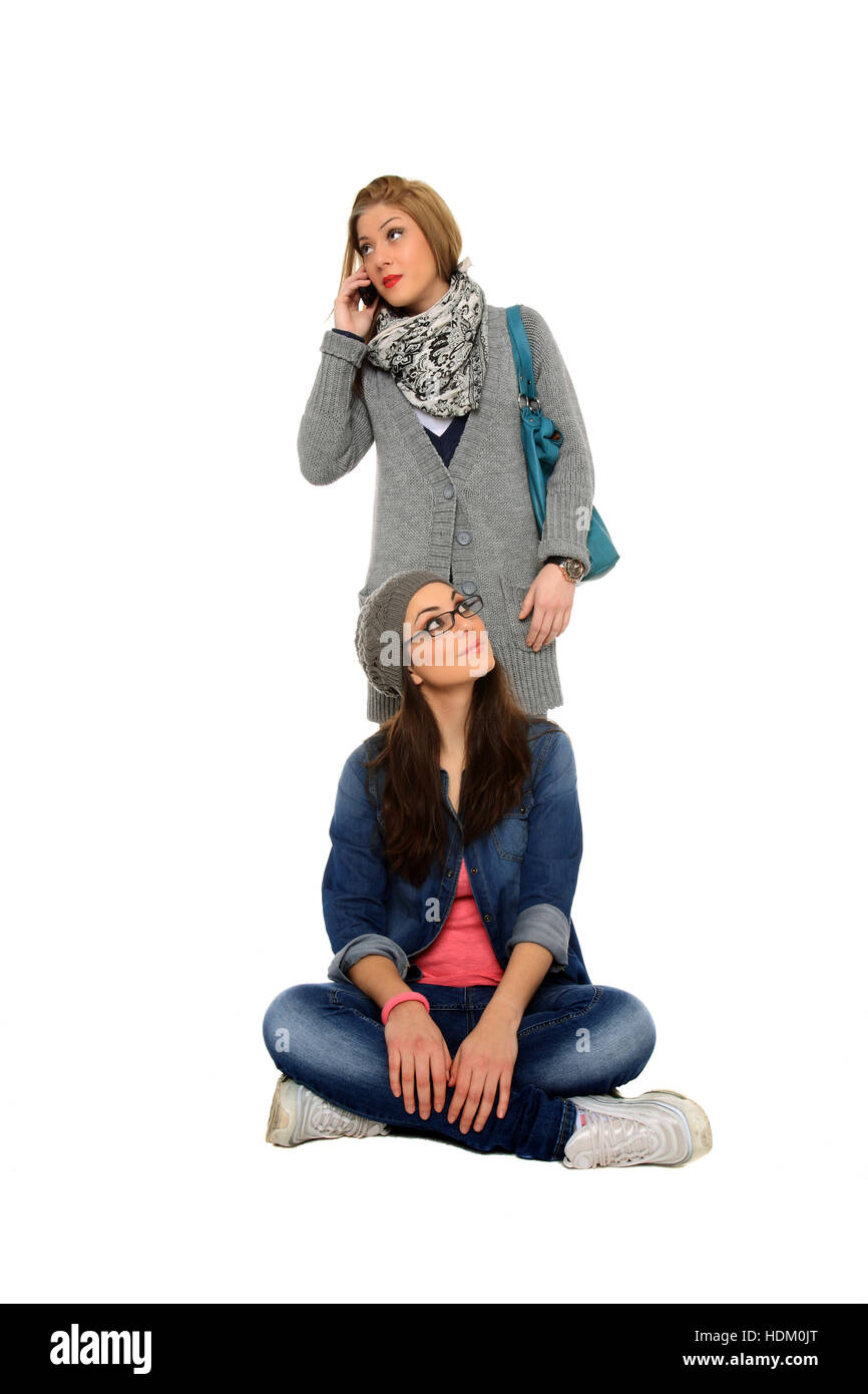 two girls making a phone call isolated on a white background Stock ...