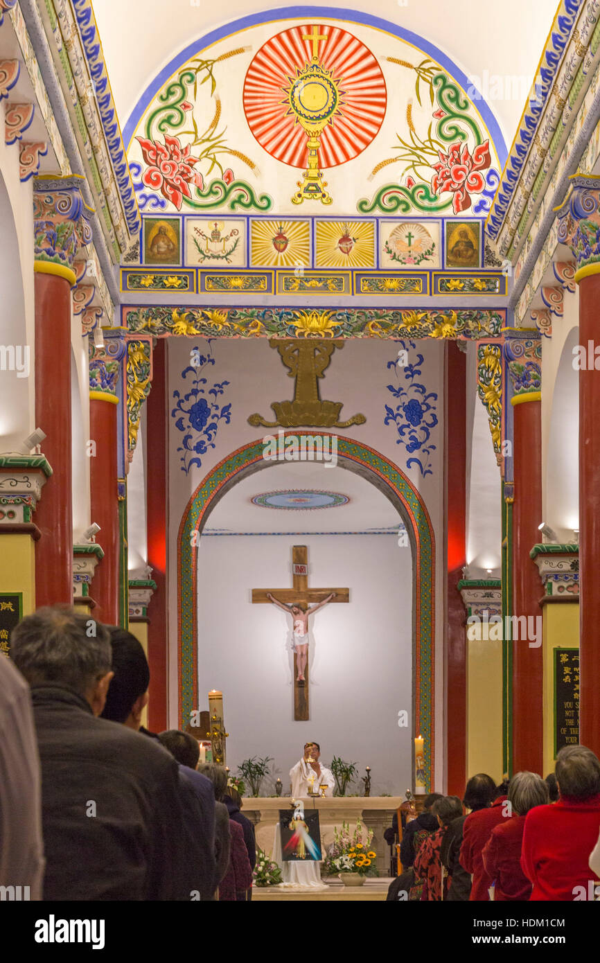 Catholic chinese praying church hi-res stock photography and images - Alamy