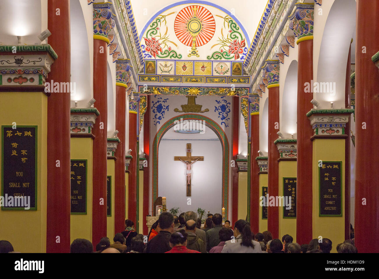 Congregation receiving communion at Tianshuijing Catholic Church, Xian ...