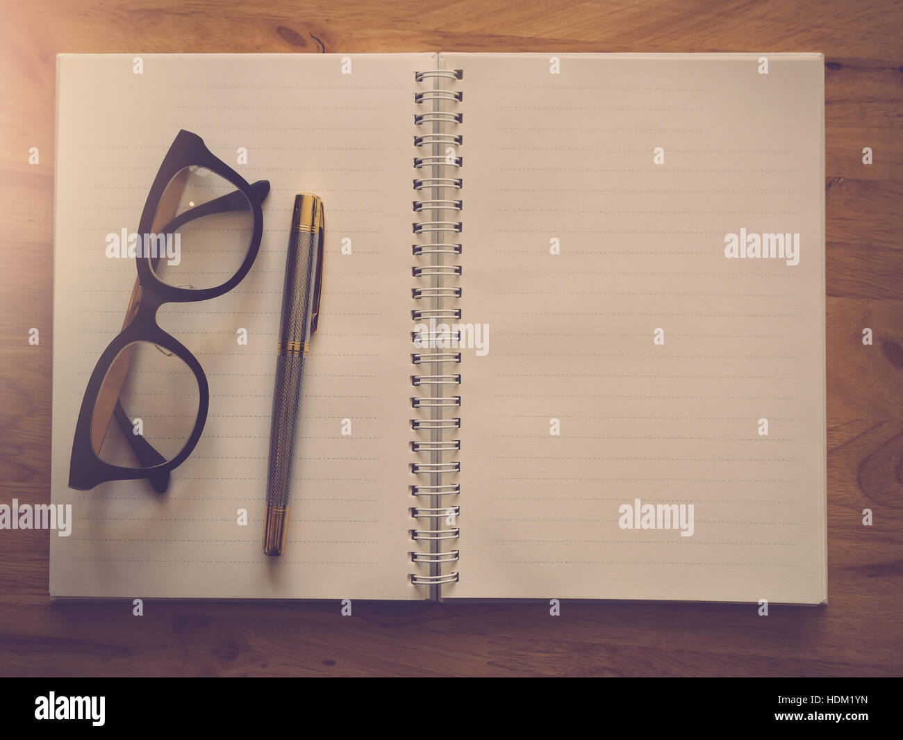 Education and office concept. Pen notebook and eyeglasses, Vintage ...