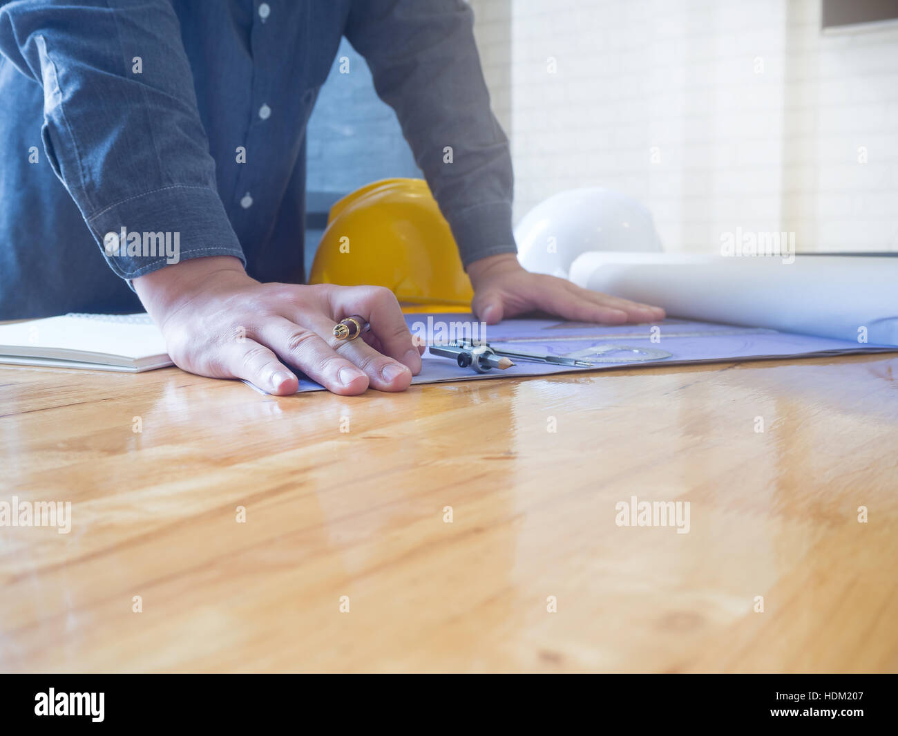 Architect concept, Architects working with blueprints in the office ...