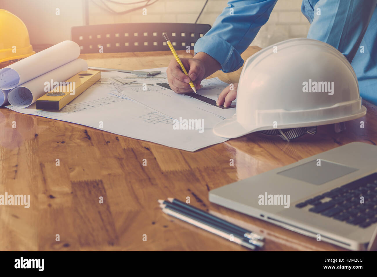 Architect concept, Architects working with blueprints in the office ...