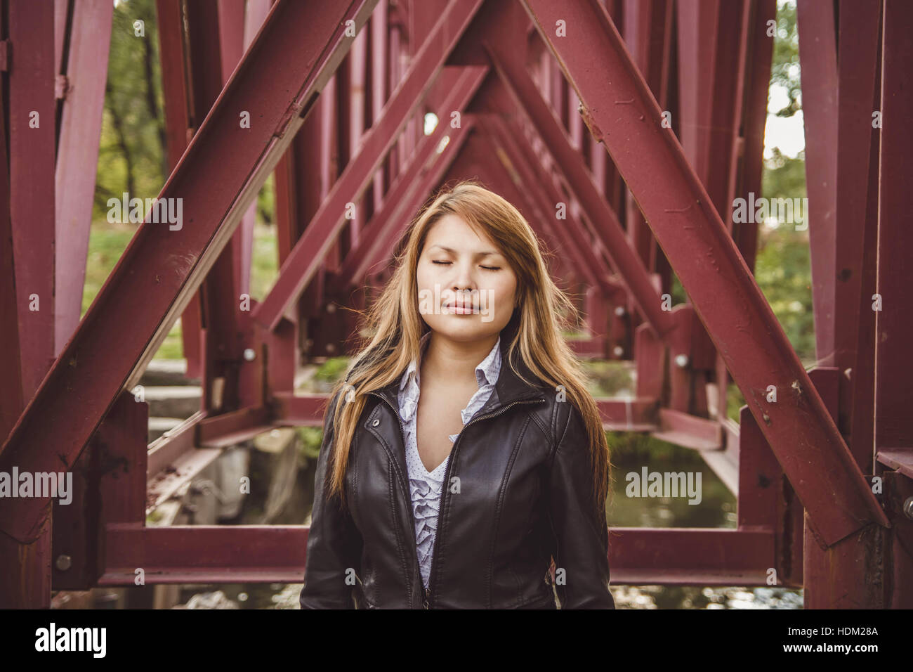 the girl at the bridge piles Stock Photo - Alamy