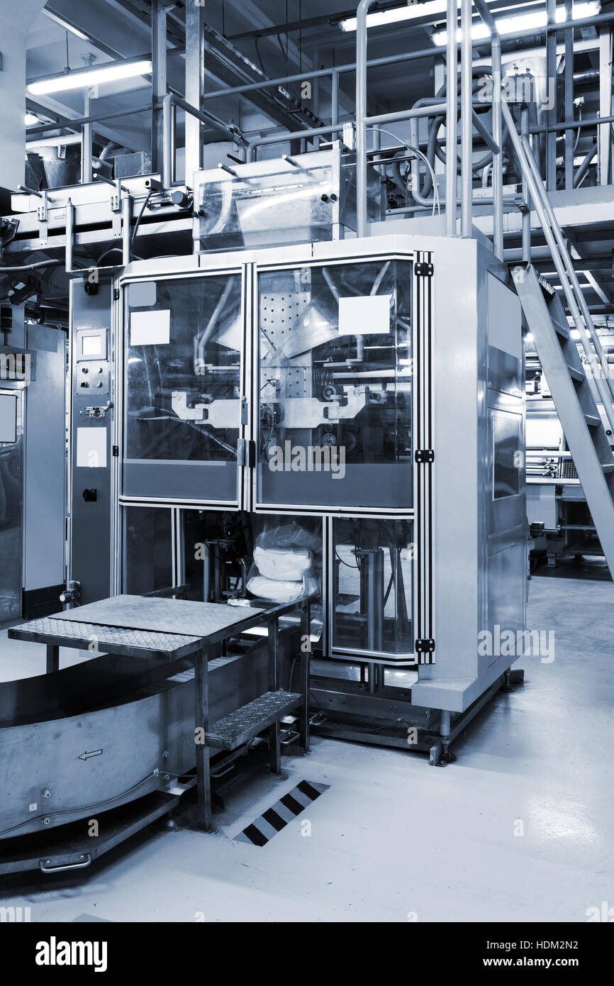 new equipment for packaging in a modern plant Stock Photo - Alamy