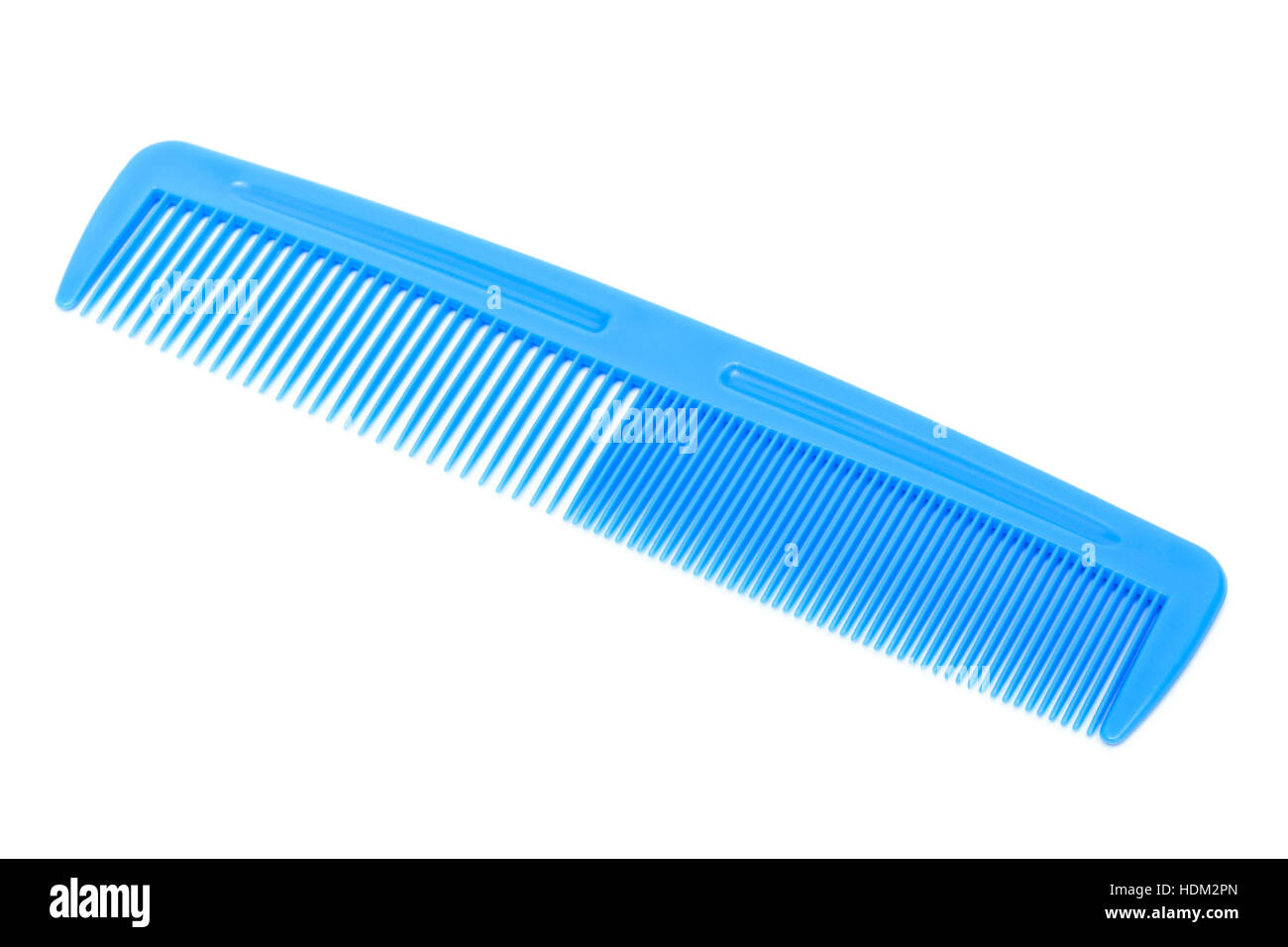 new blue plastic comb on a white background Stock Photo - Alamy