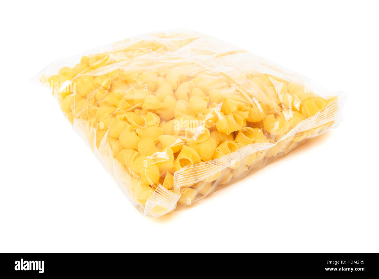 pasta in the package on a white background Stock Photo - Alamy