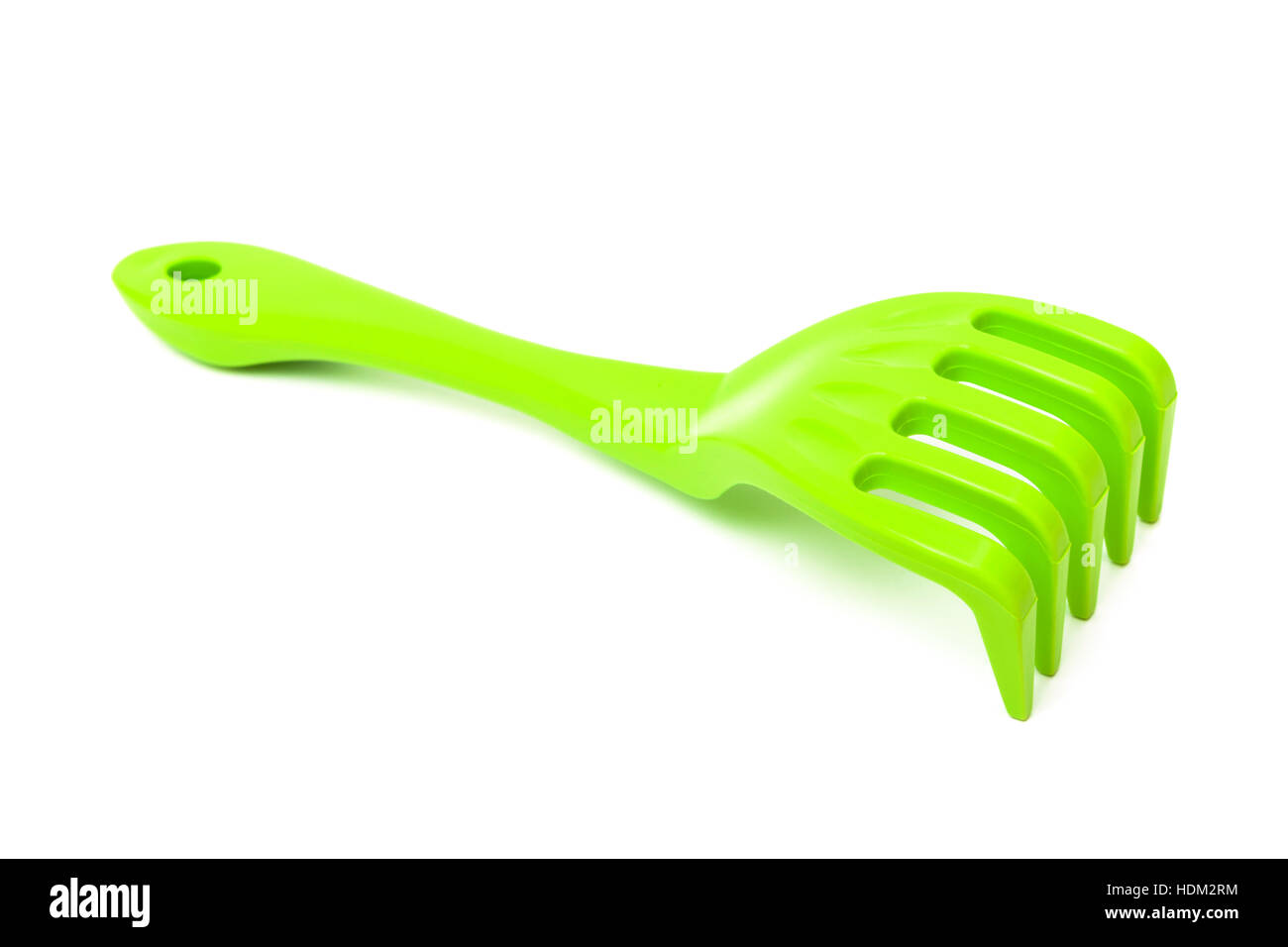 small garden rakes against a white background Stock Photo - Alamy