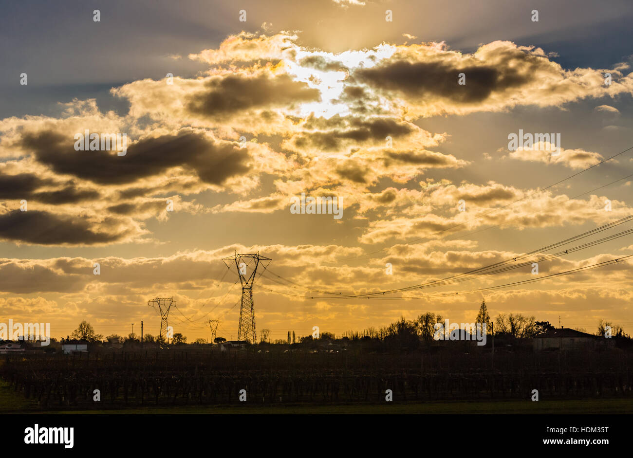 backlight orange sky with dark clouds on country landscape Stock Photo ...