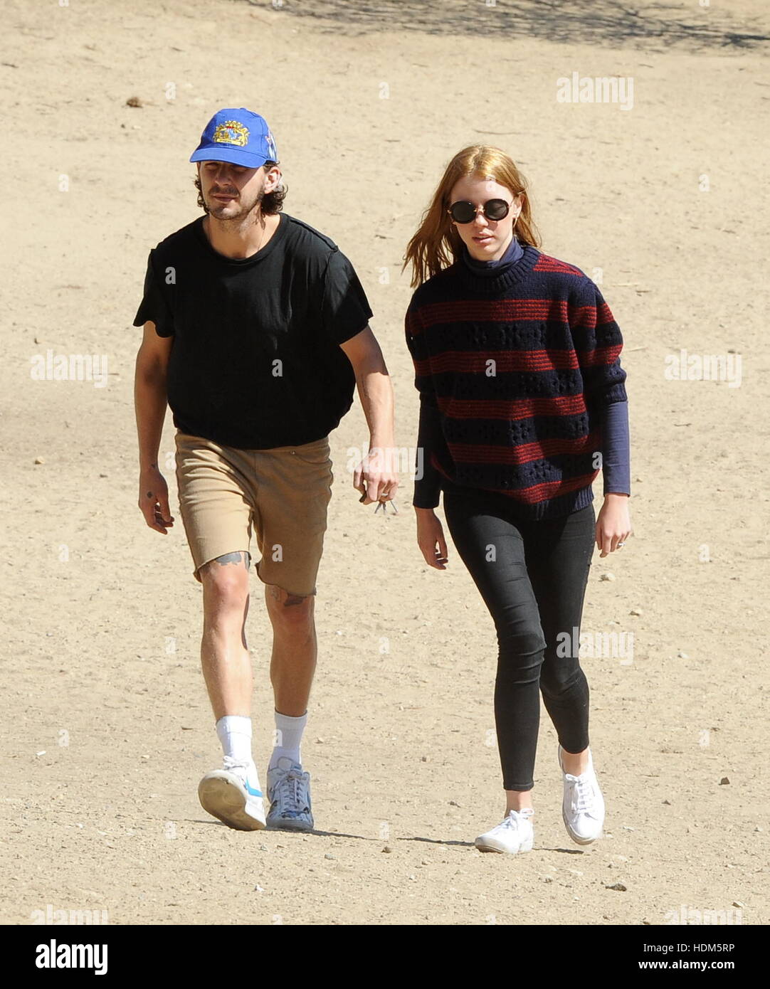 Newly weds Shia LaBeouf and Mia Goth out at a park with their bulldog ...